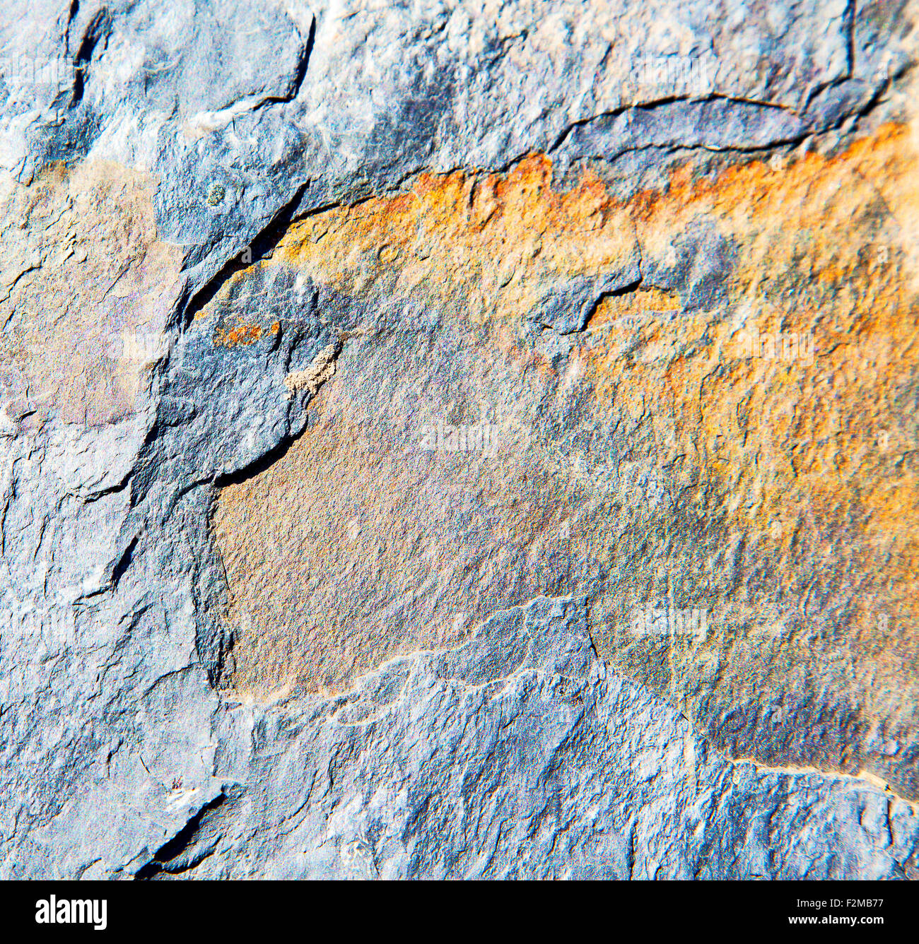 rocks stone and red orange gneiss in the wall of morocco Stock Photo ...