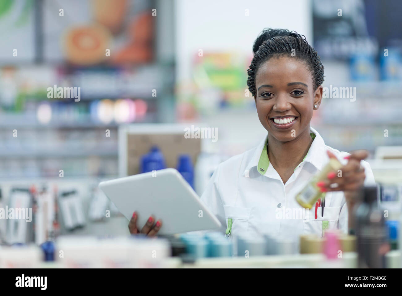 Pharmacist taking stock drugstore hi-res stock photography and images ...