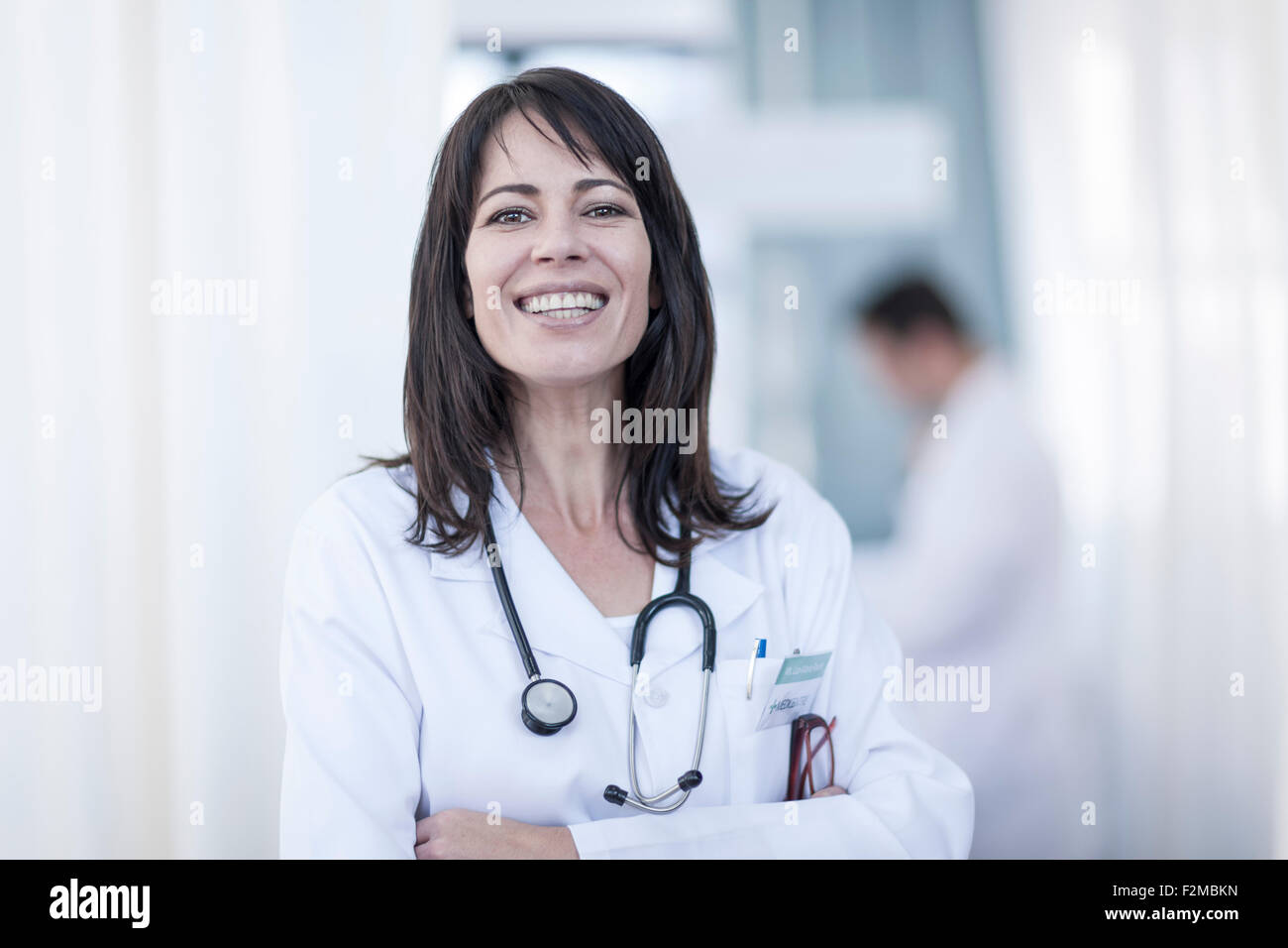 Portrait of smiling doctor Stock Photo - Alamy
