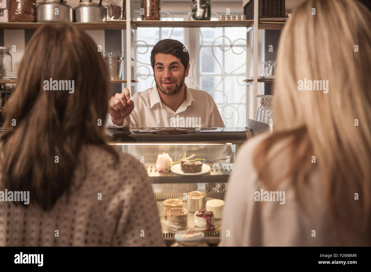People choosing cake in bakery hi-res stock photography and images - Alamy