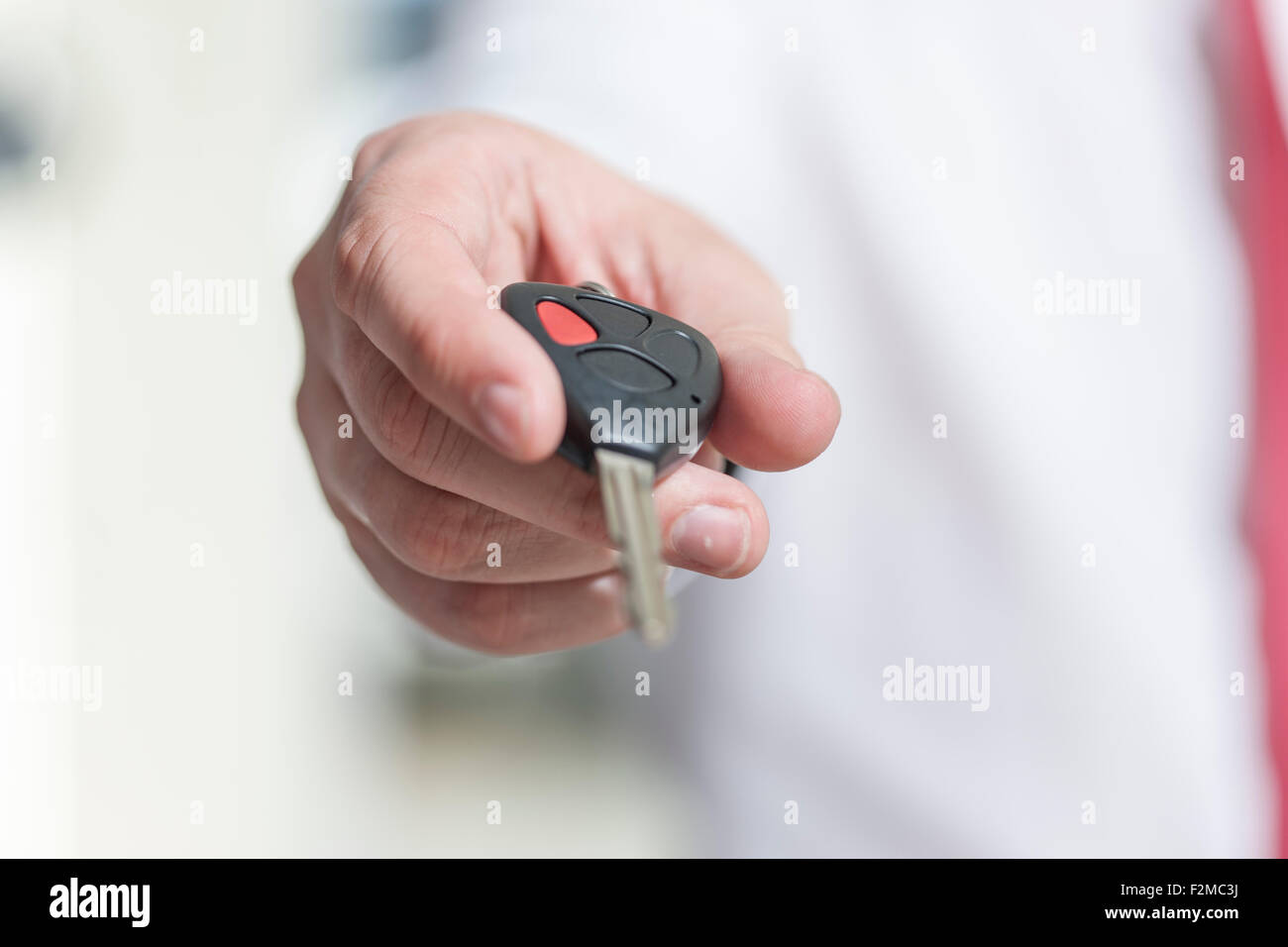 Handing over of car key Stock Photo - Alamy