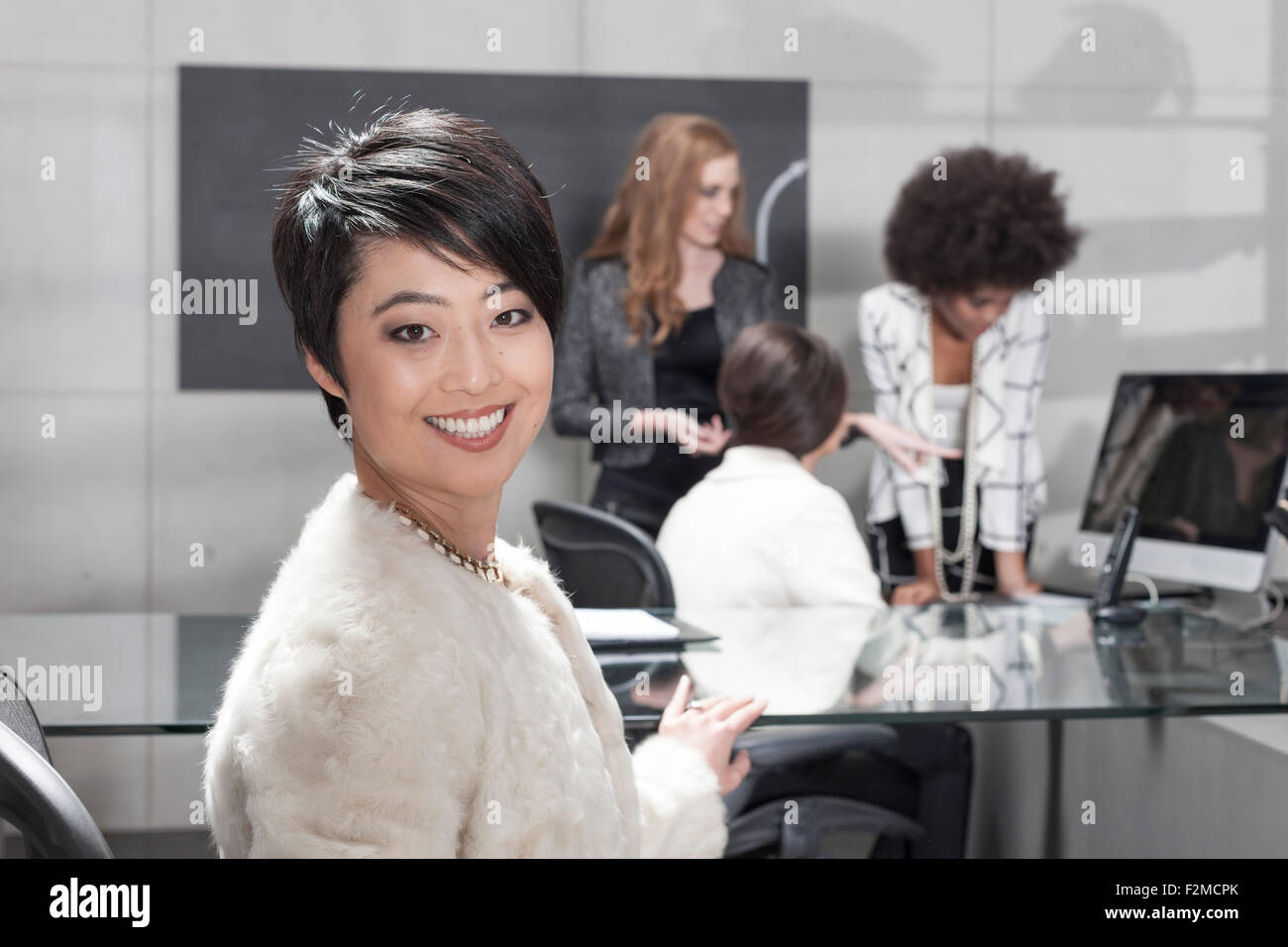 Portrait of smiling shop assistant Stock Photo - Alamy