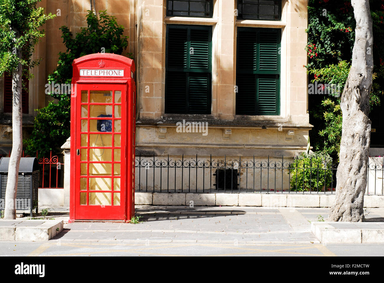 Telephone box in a street of Rabat in Malta island Stock Photo - Alamy