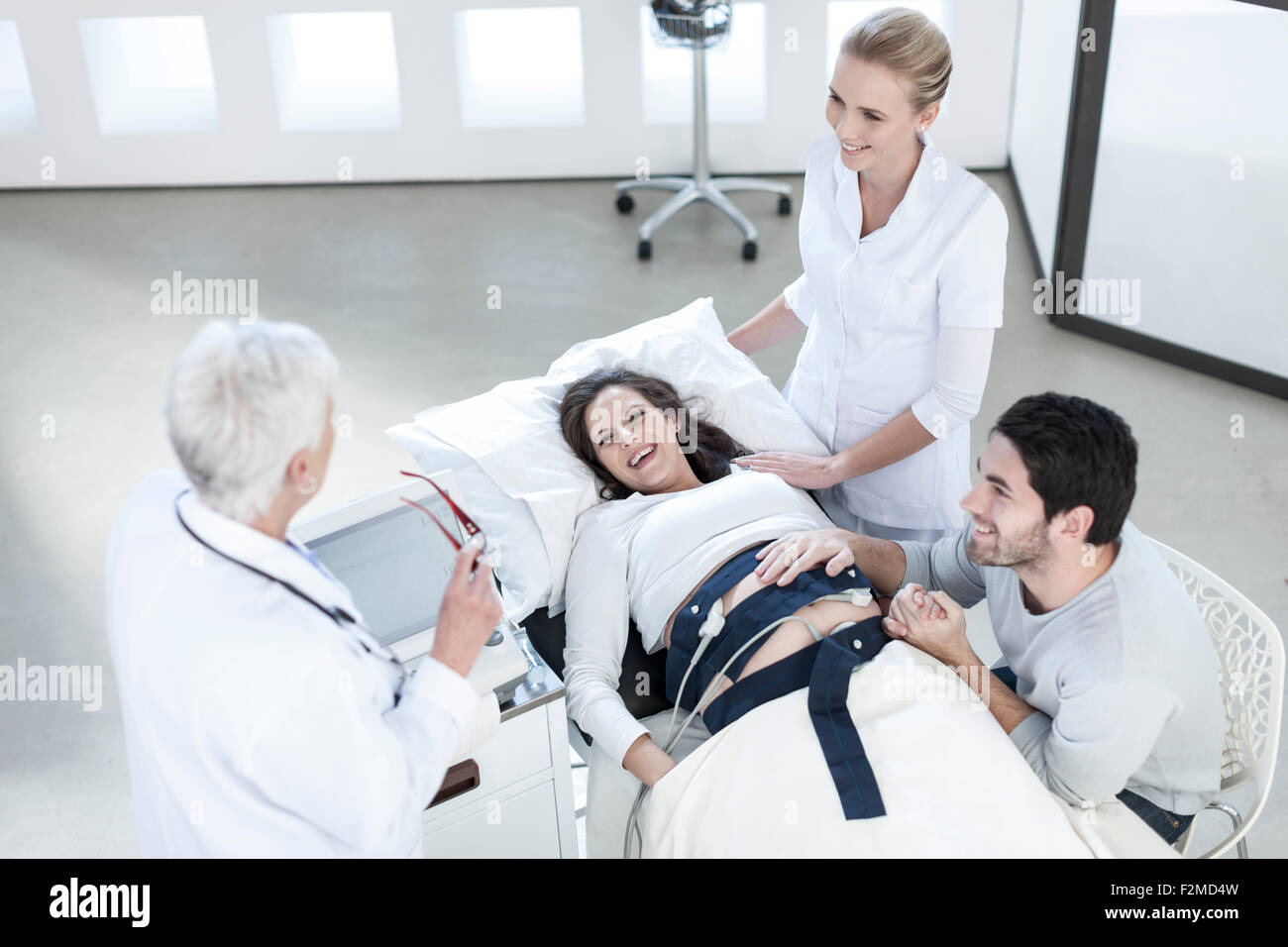 Pregnant woman getting medical check up Stock Photo - Alamy
