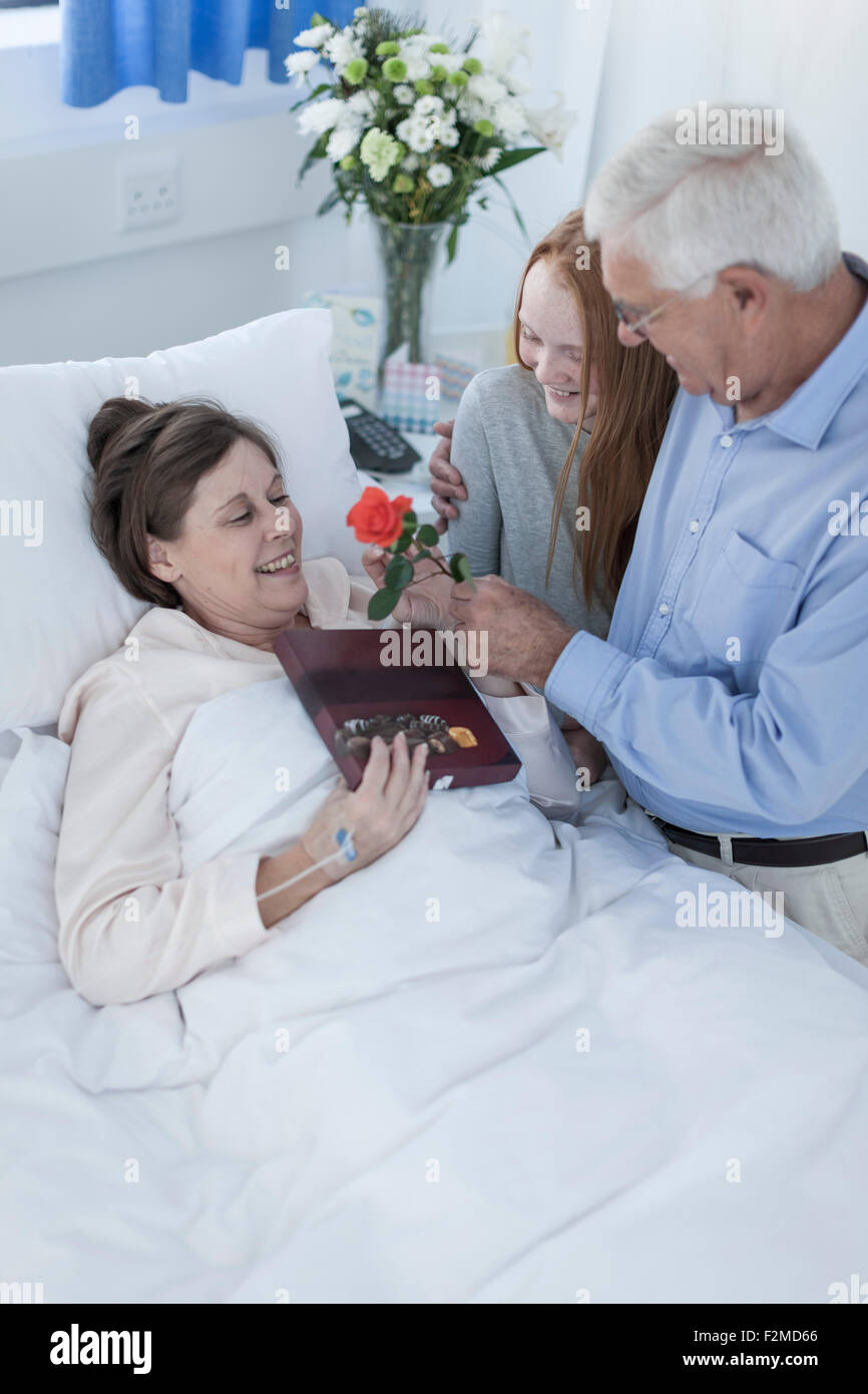 Mature couple kissing in bed hi-res stock photography and images - Alamy