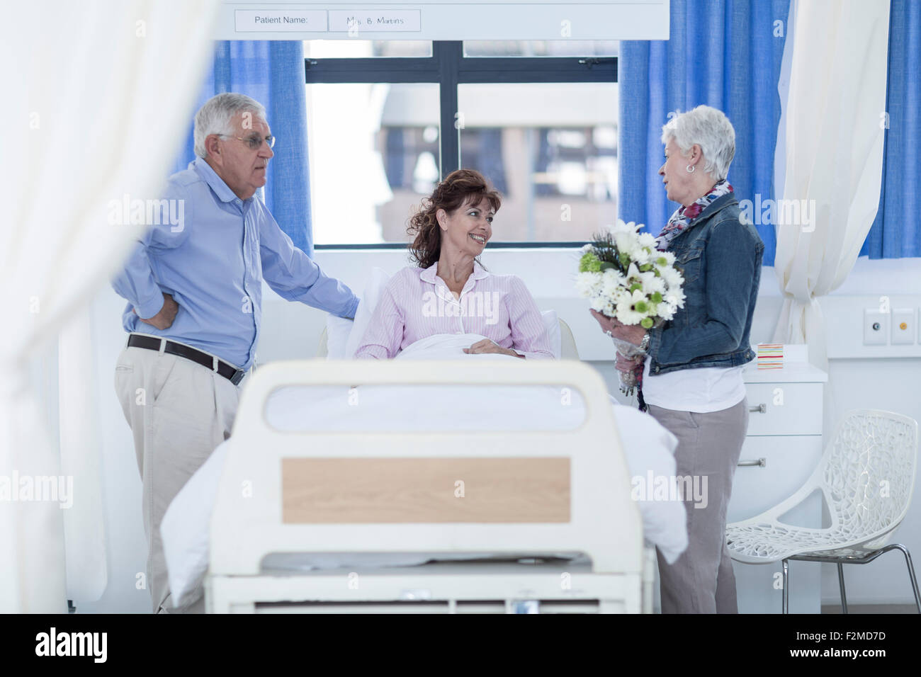Visiting friend in hospital hi-res stock photography and images - Alamy