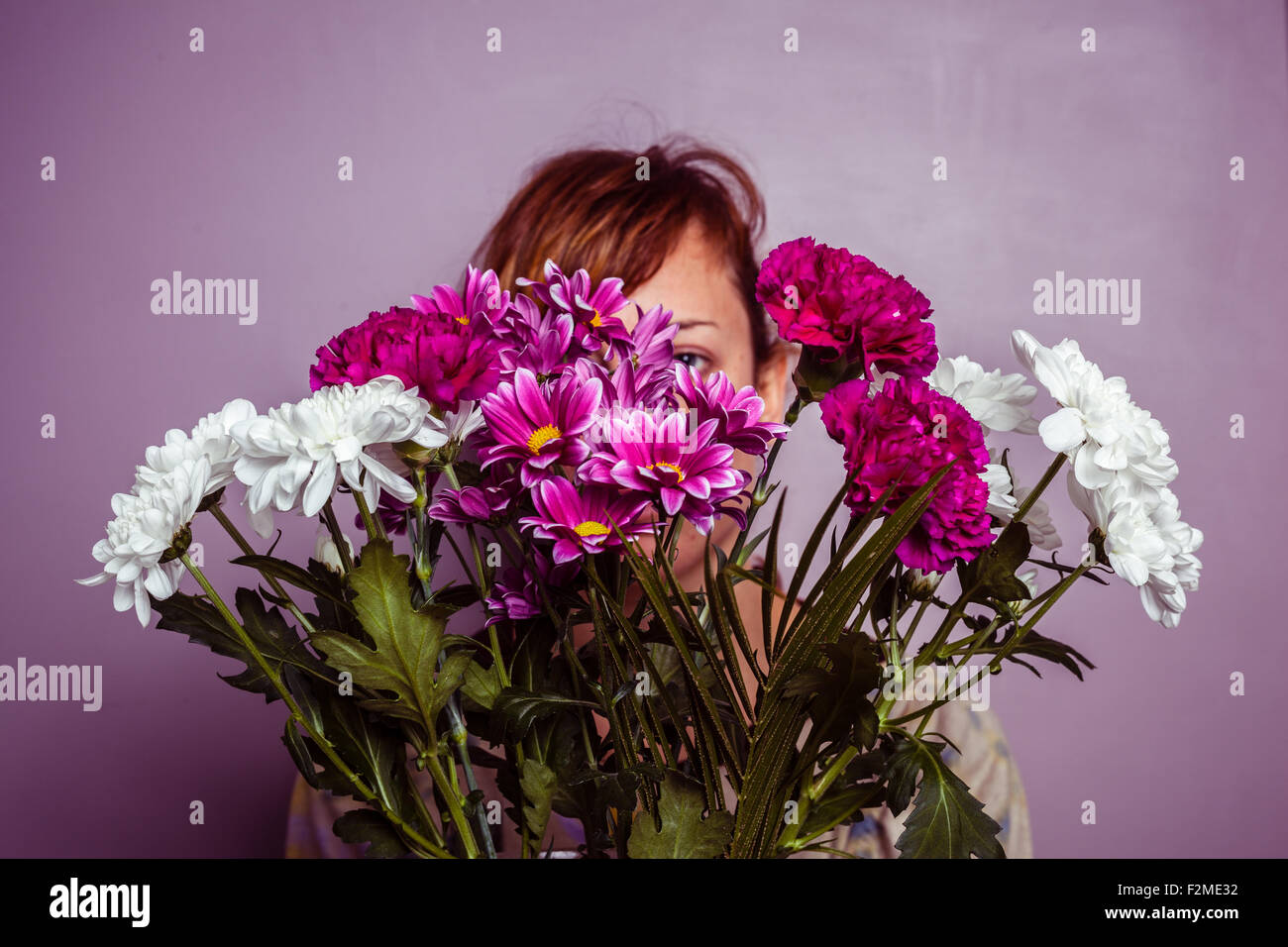 Modern woman hiding behind hi-res stock photography and images - Alamy