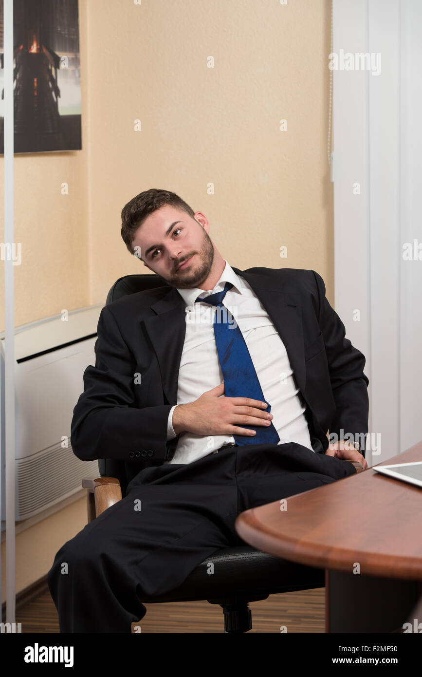 Young Business Man With Problems And Stress In The Office Stock Photo ...