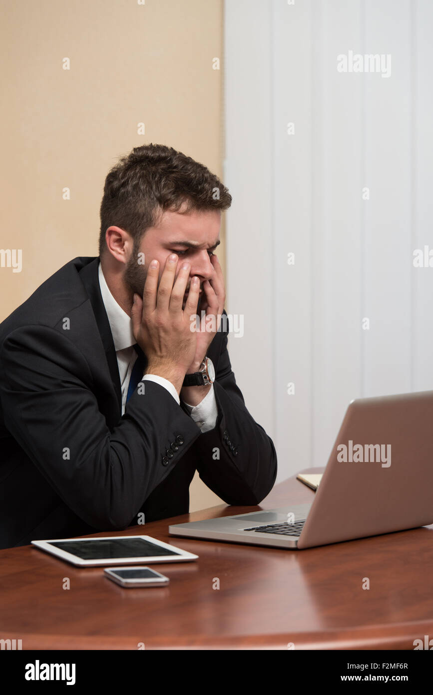 Young Business Man With Problems And Stress In The Office Stock Photo ...