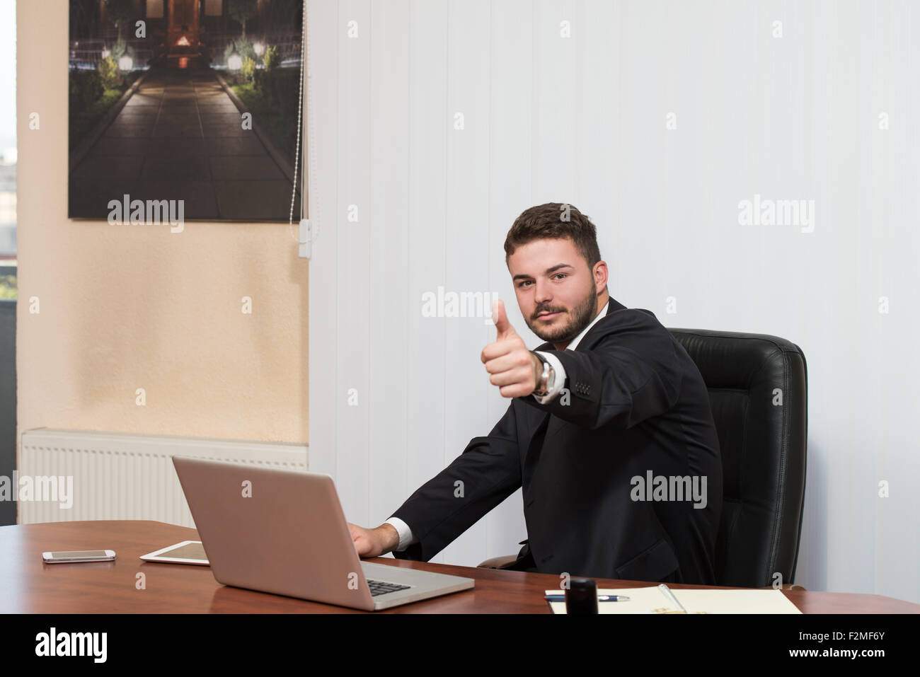 Happy Smiling Cheerful Business Man With Thumbs Up Gesture Stock Photo ...