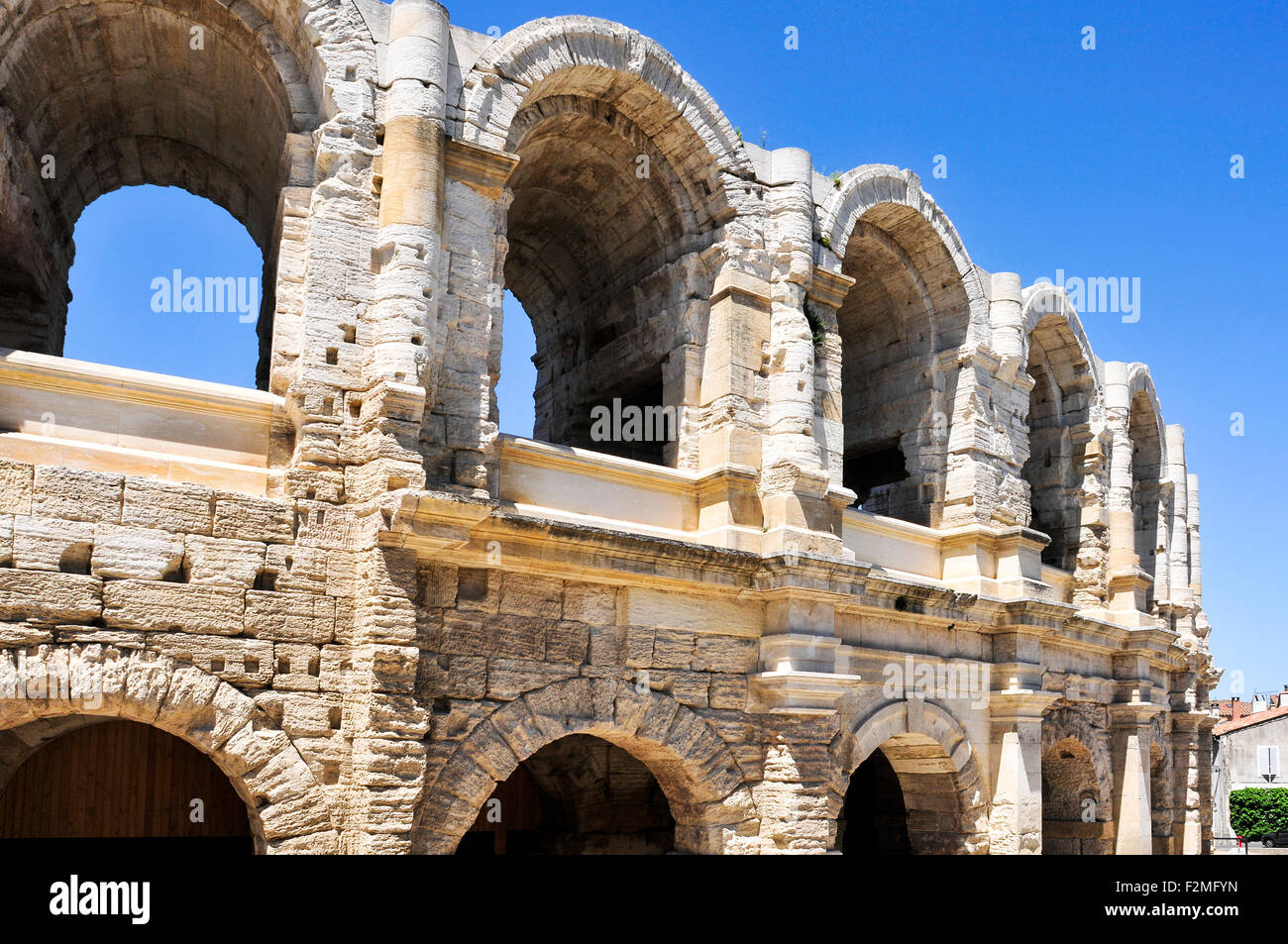 a view of the Roman amphitheatre of Arles, France, also known as Arena ...