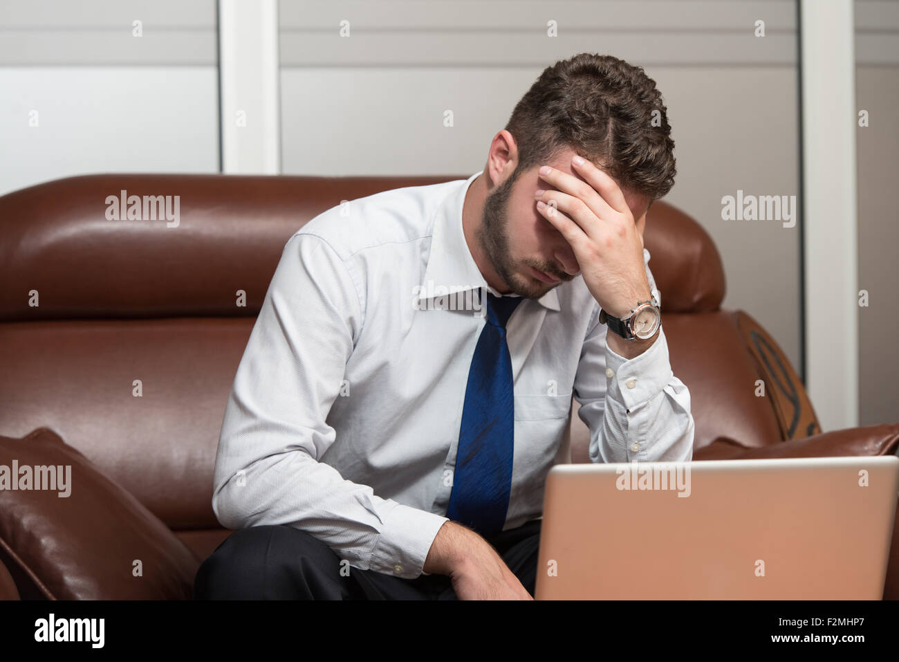 Young Business Man With Problems And Stress In The Office Stock Photo ...