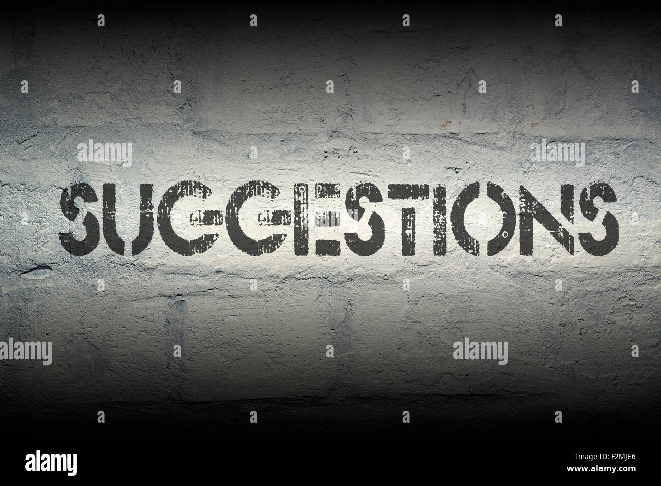 suggestions stencil print on the grunge white brick wall Stock Photo ...