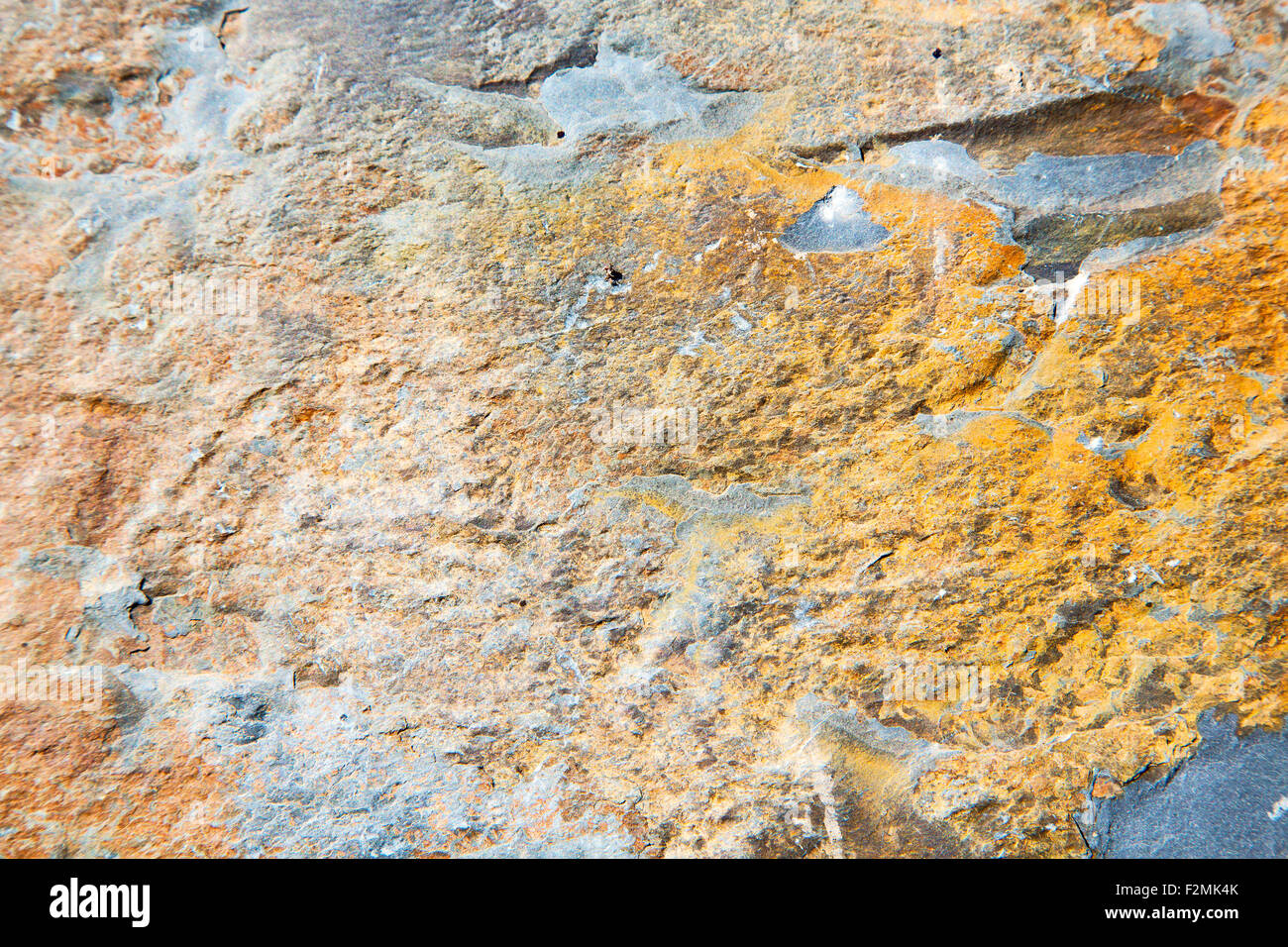 rocks stone and red orange gneiss in the wall of morocco Stock Photo ...