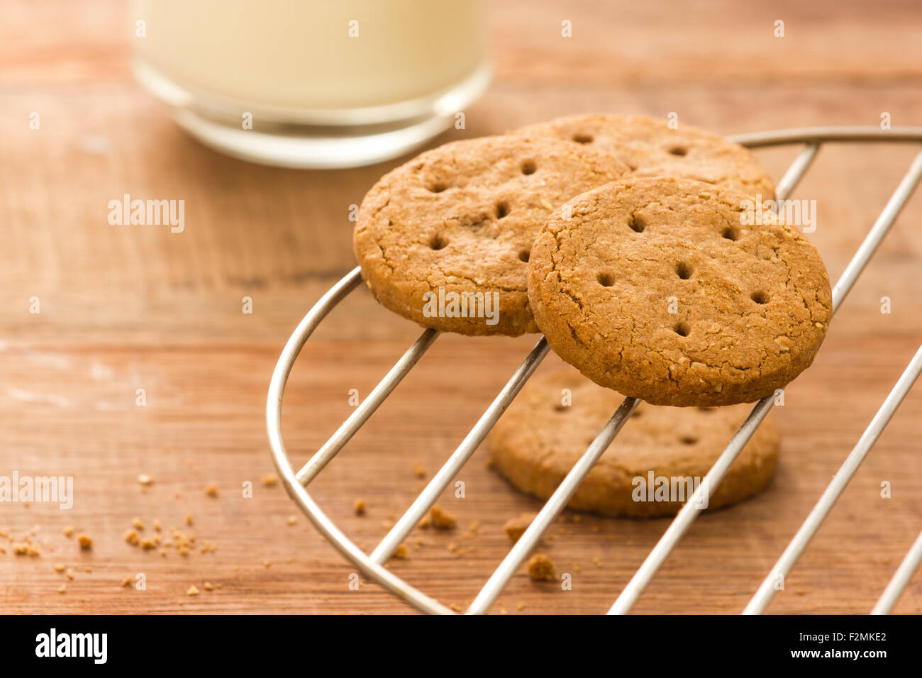 fresh cookies with milk on a wood background Stock Photo - Alamy