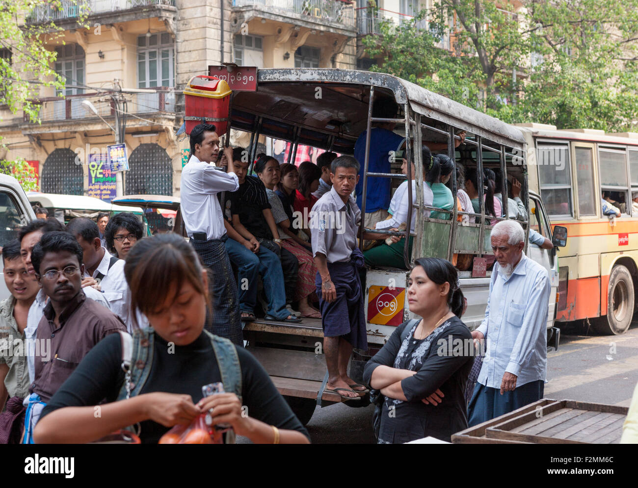 Songthaew pickup truck bus at passenger stop on Mahabandoola Rd, Yangon ...