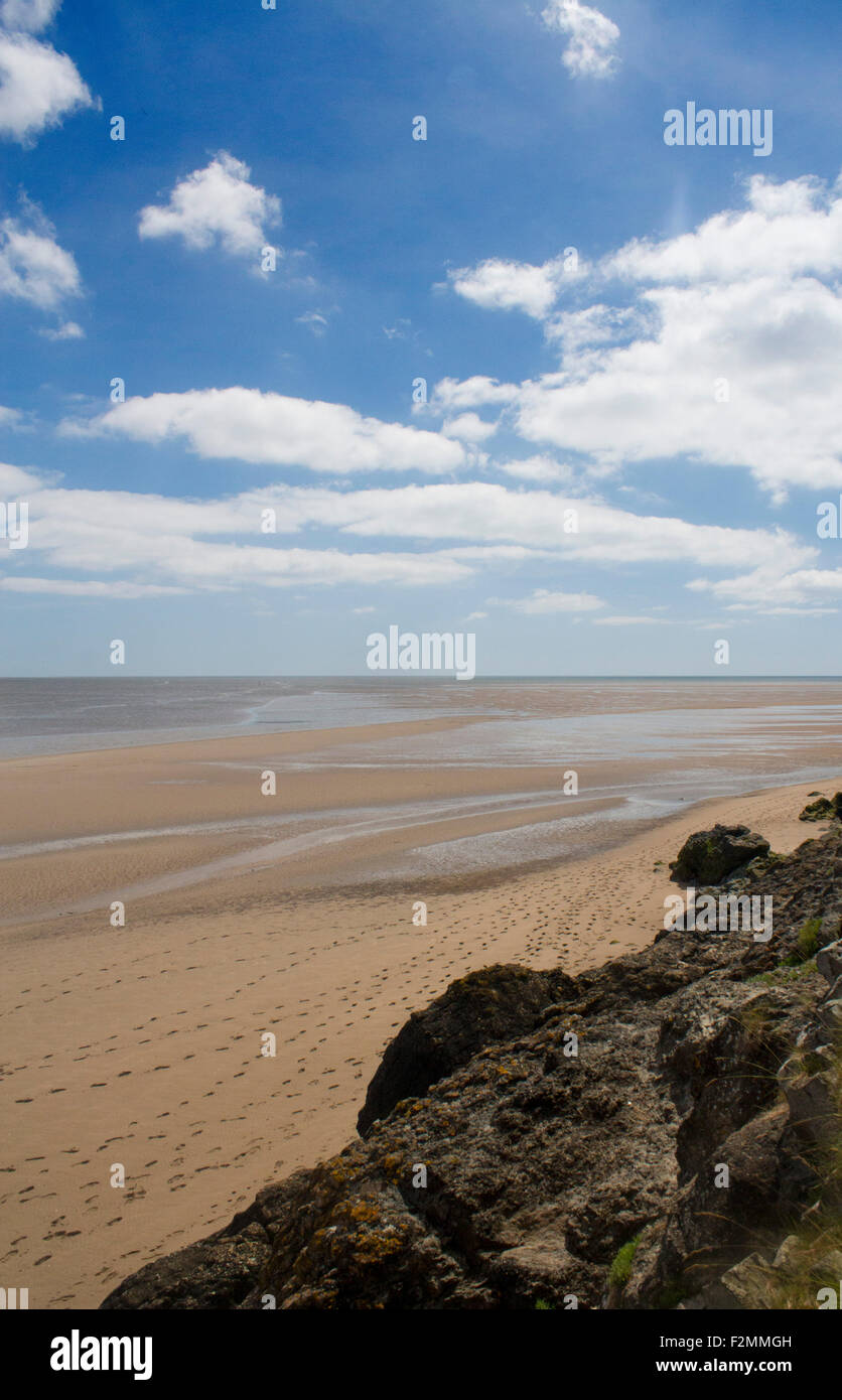 Scotts Bay on Tywi Towy estuary with rows of footprints in sand along ...