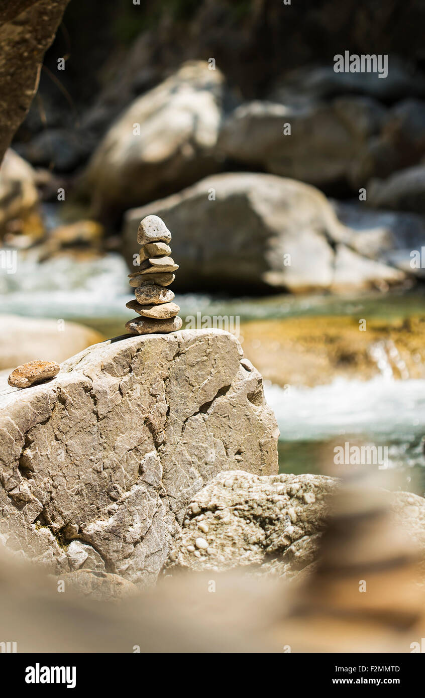Stacked rock tower in nature, man made Stock Photo - Alamy
