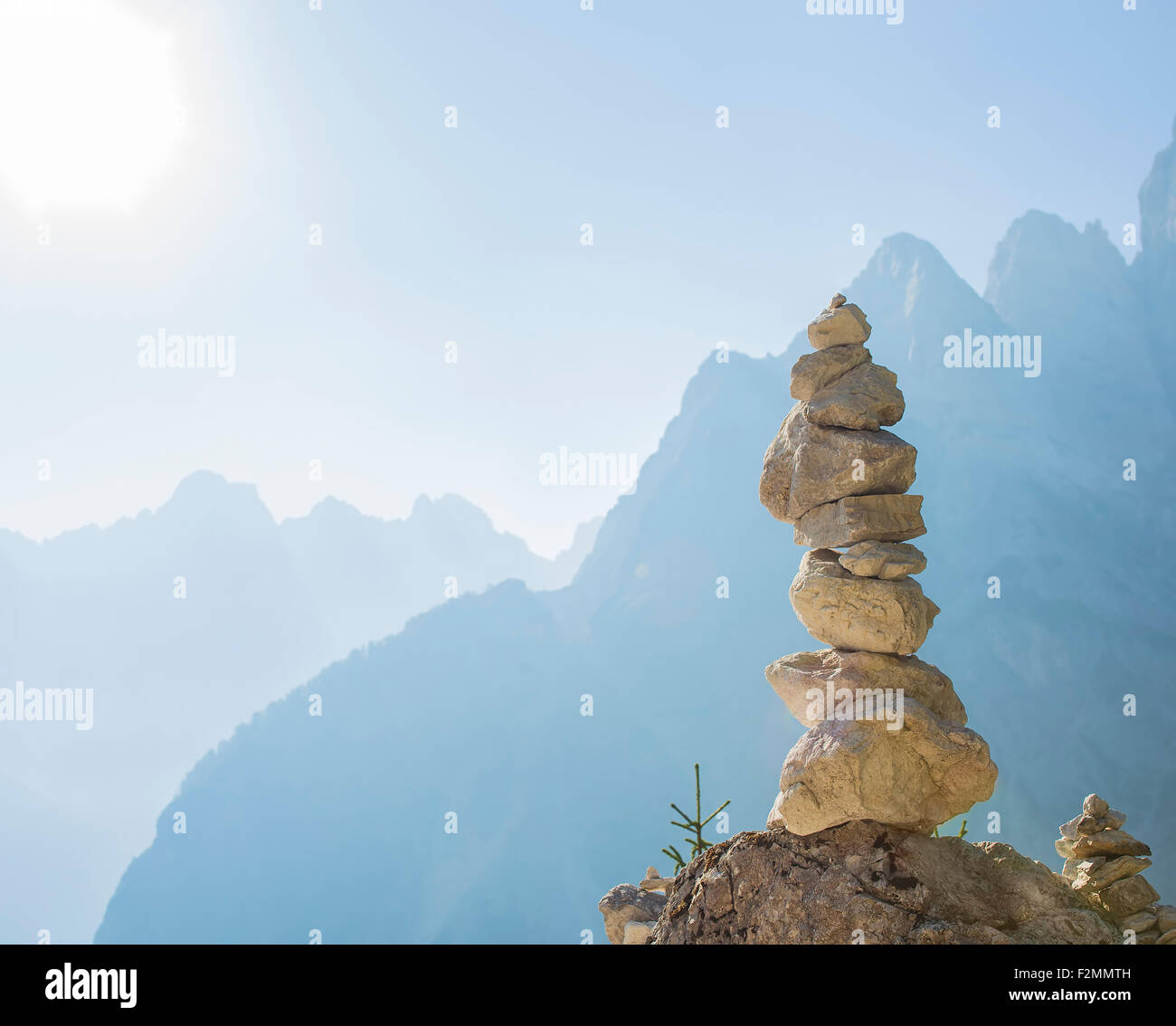 Man meditating mountain rock white hi-res stock photography and images ...