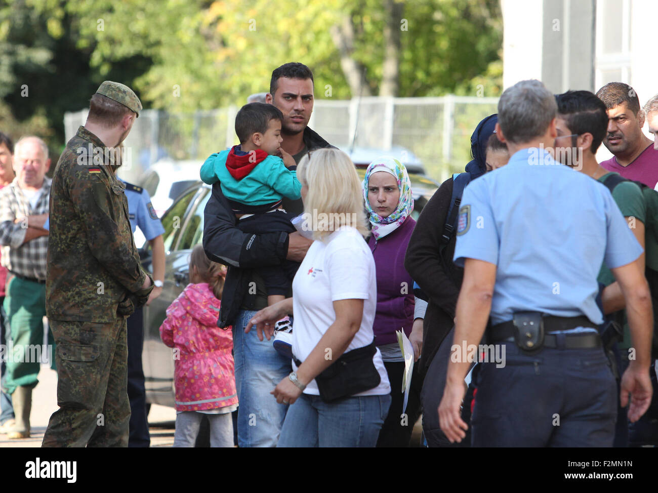 Gera, Germany. 21st Sep, 2015. Refugees arrive at an accommodation in ...