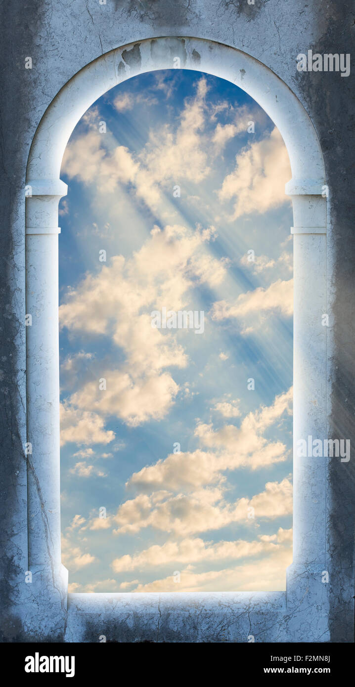 Window with a cloudy background view and sunrays Stock Photo - Alamy