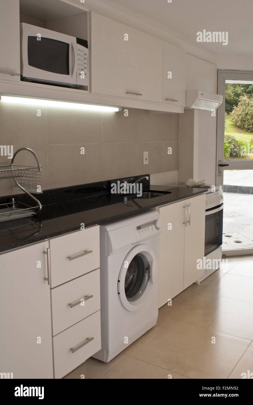 Modern style kitchen interior design with outdoor garden view Stock ...