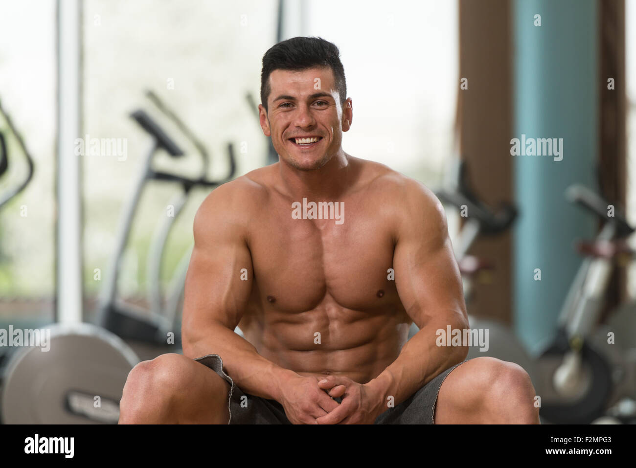 Good Looking And Attractive Young Man With Muscular Body Relaxing In ...