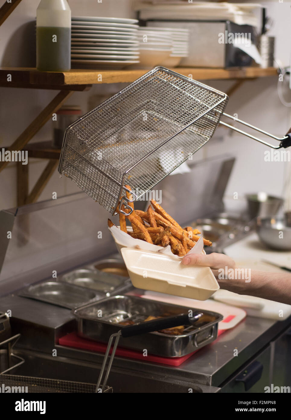 French fries made in a restaurant Stock Photo - Alamy
