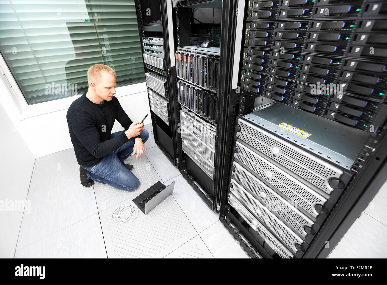 Consultant working blade server in hi-res stock photography and images ...