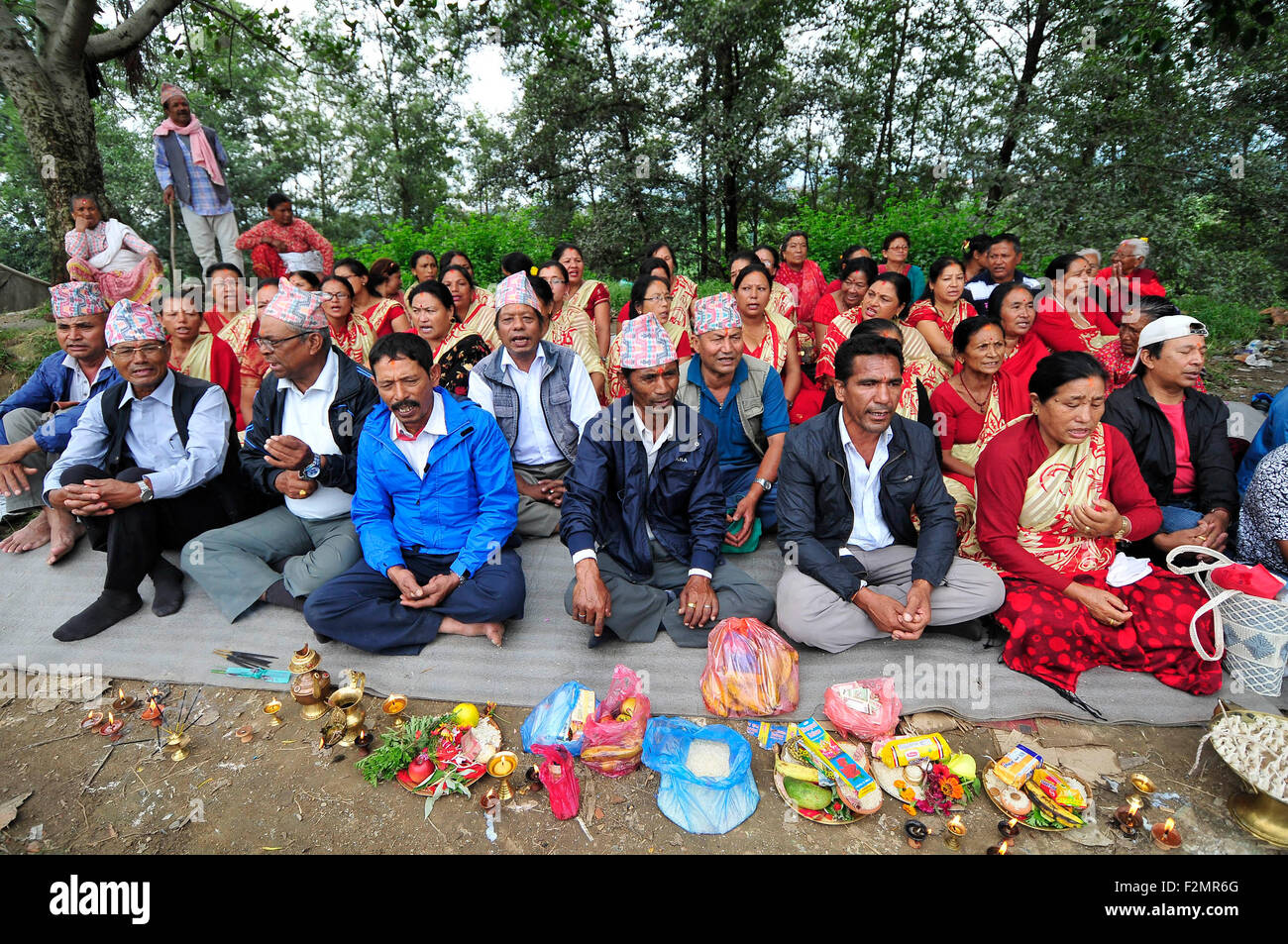 Kathmandu, Nepal. 21st Sep, 2015. Devotees chanting ritual matra ...