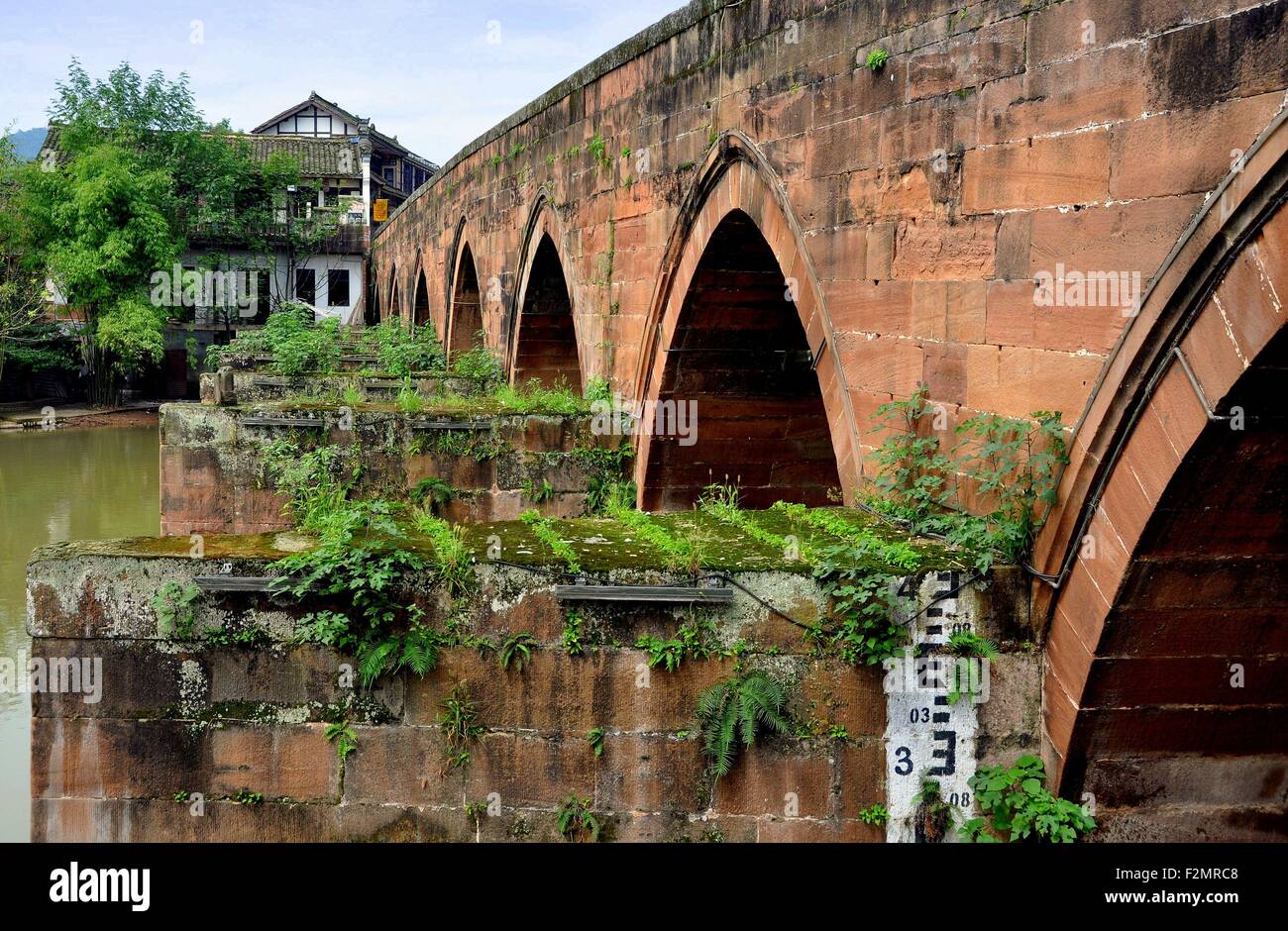 Ping Le Ancient Town, China: Coral-colored sandstone bridge with gothic ...