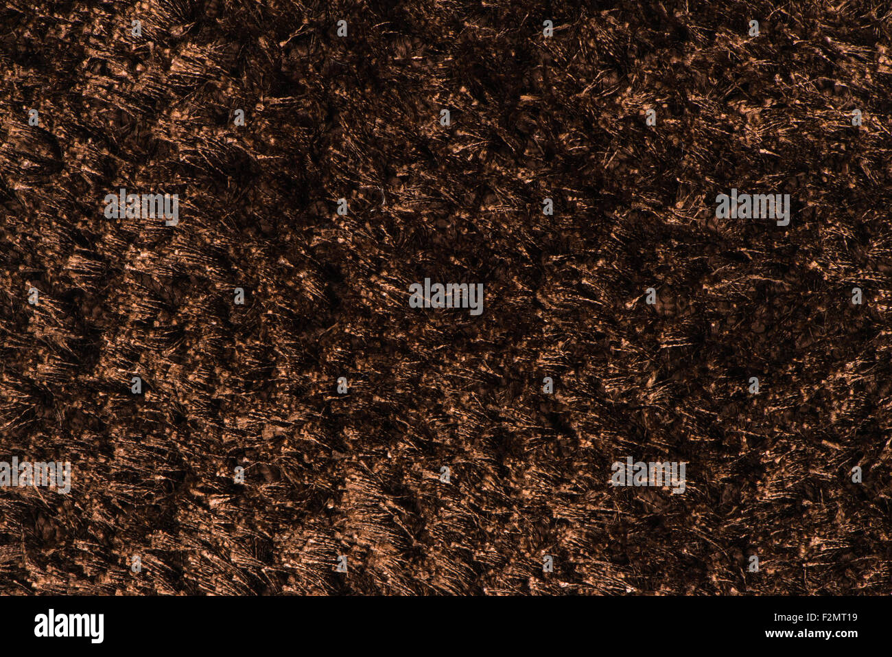 Closeup detail of brown carpet texture background Stock Photo - Alamy