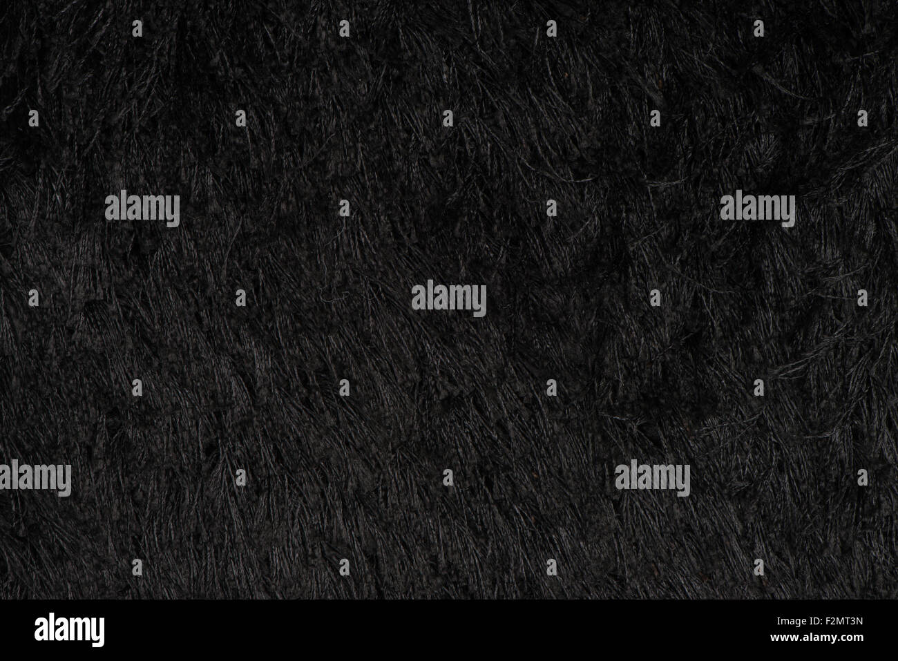 Closeup detail of black carpet texture background Stock Photo - Alamy