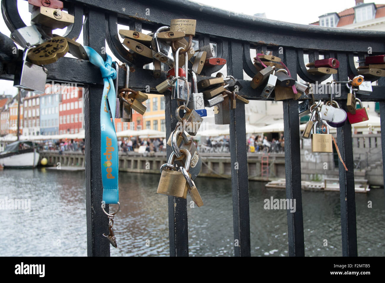 Love locks on the canal bridge at Nyhavn New Harbour Copenhagen Denmark ...