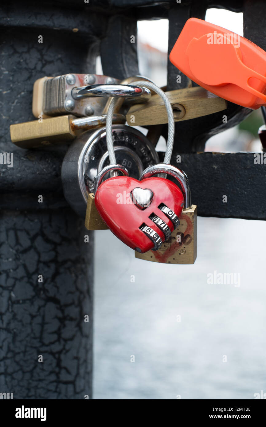 Love locks on the canal bridge at Nyhavn New Harbour Copenhagen Denmark ...