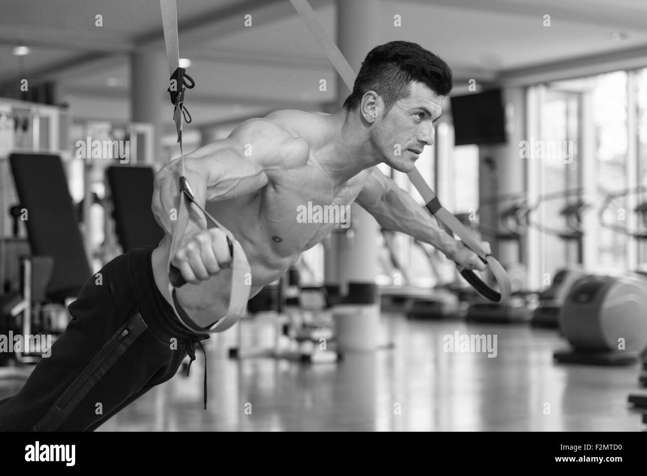 Black man trx exercise hi-res stock photography and images - Alamy