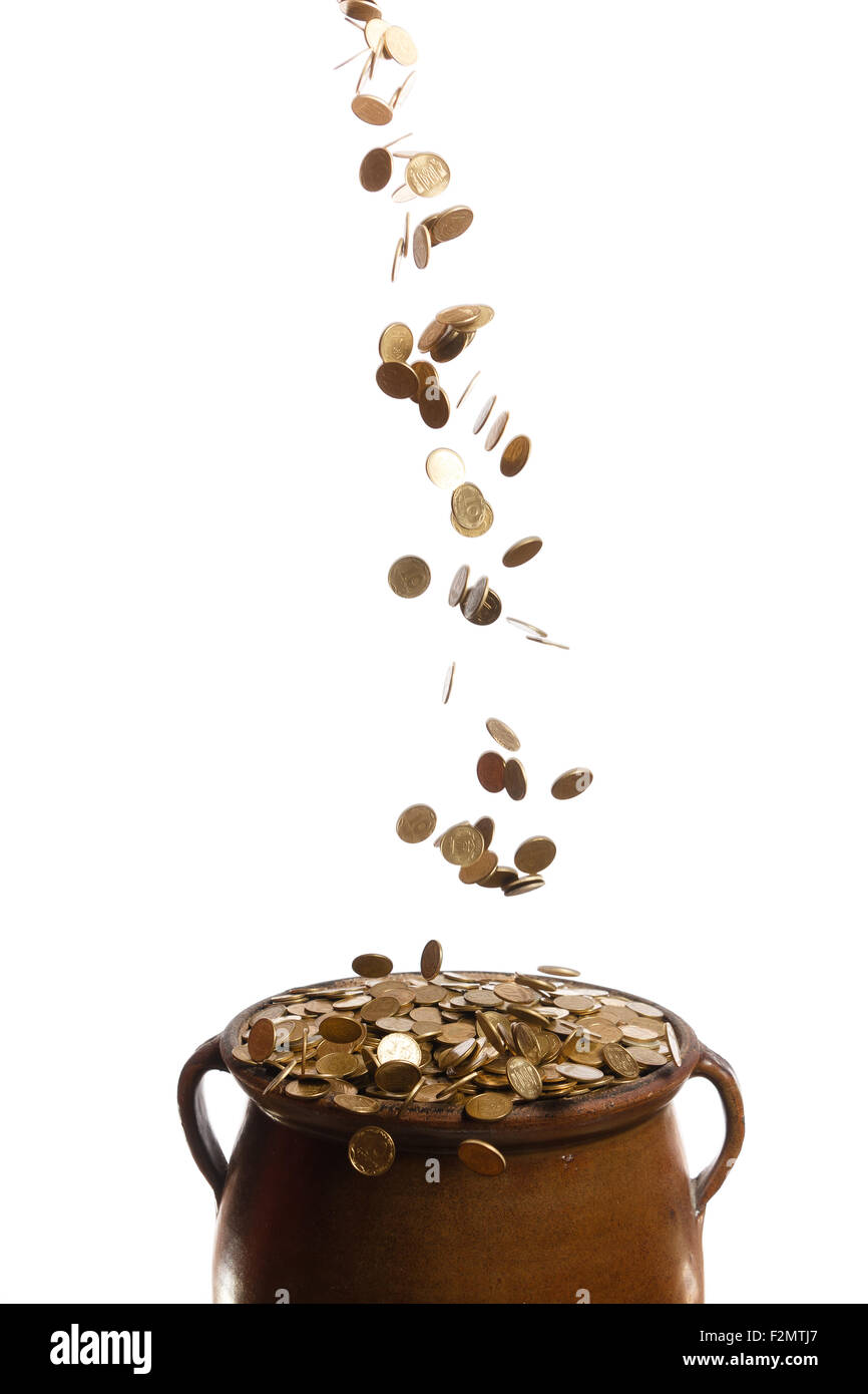 gold coins falling in the vintage pot Stock Photo - Alamy