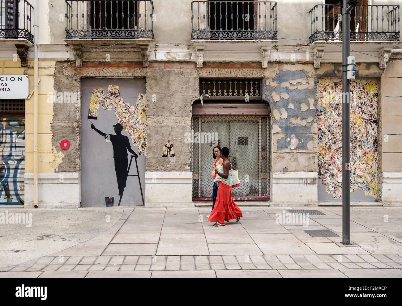 Mural painting of Silvestre Santiago, whose alias is Pejac in Malaga ...
