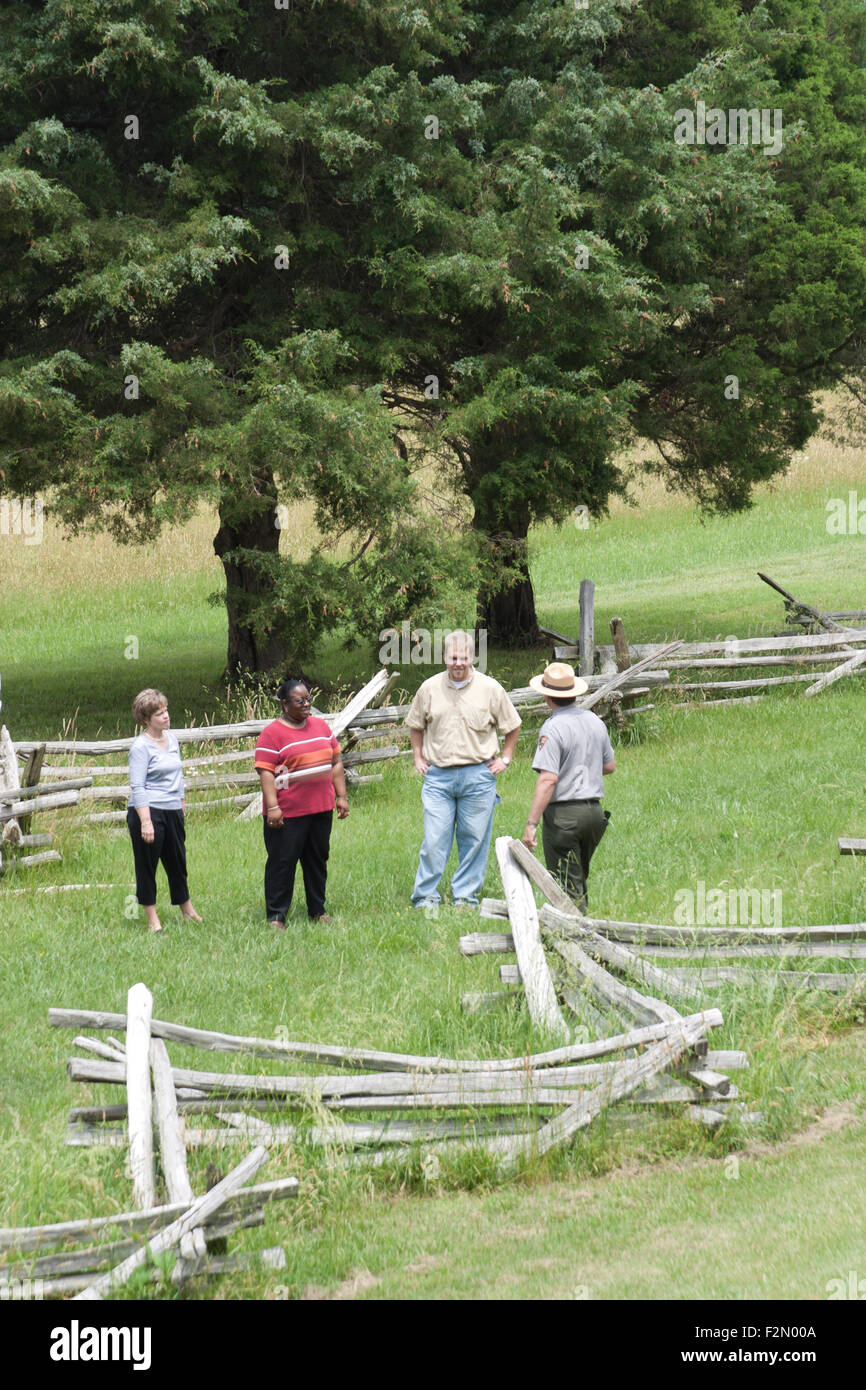 A National Park Ranger educates visitors at Yorktown Battlefield ...