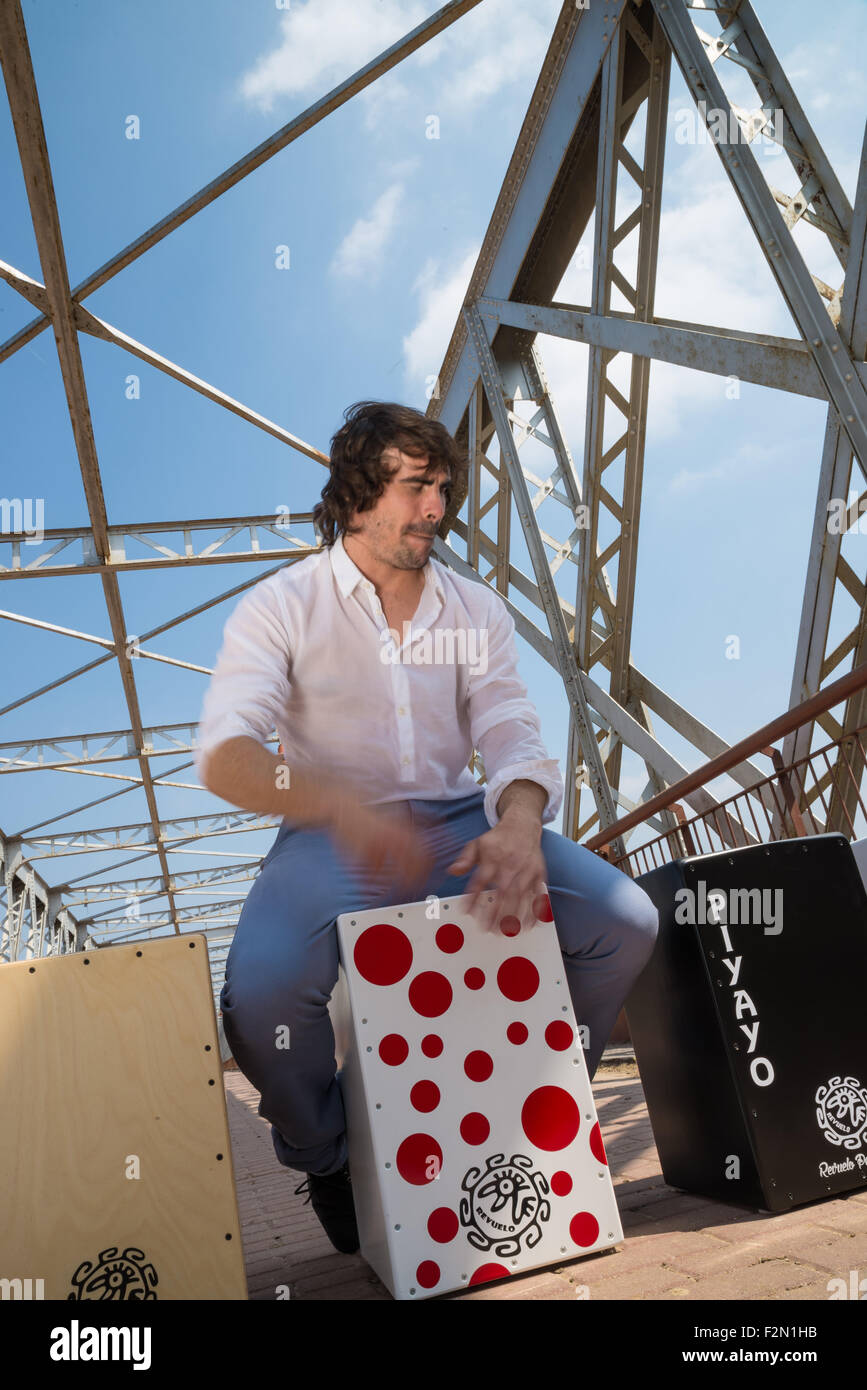 Flamenco drummer sitting on a traditional cajon Stock Photo - Alamy