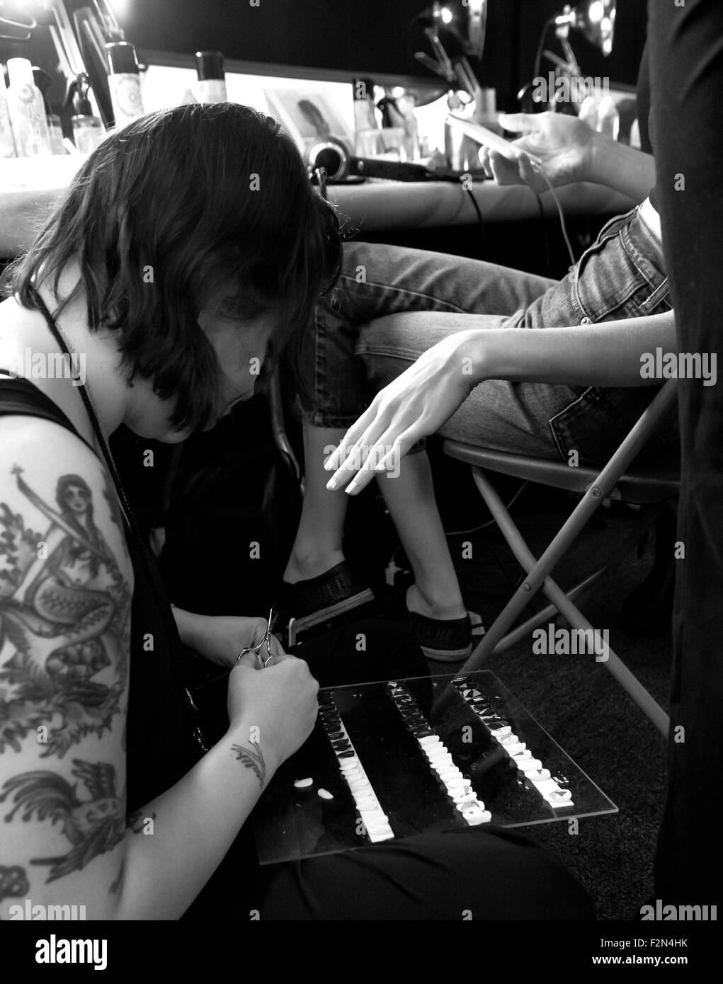 Model backstage nails Black and White Stock Photos & Images - Alamy