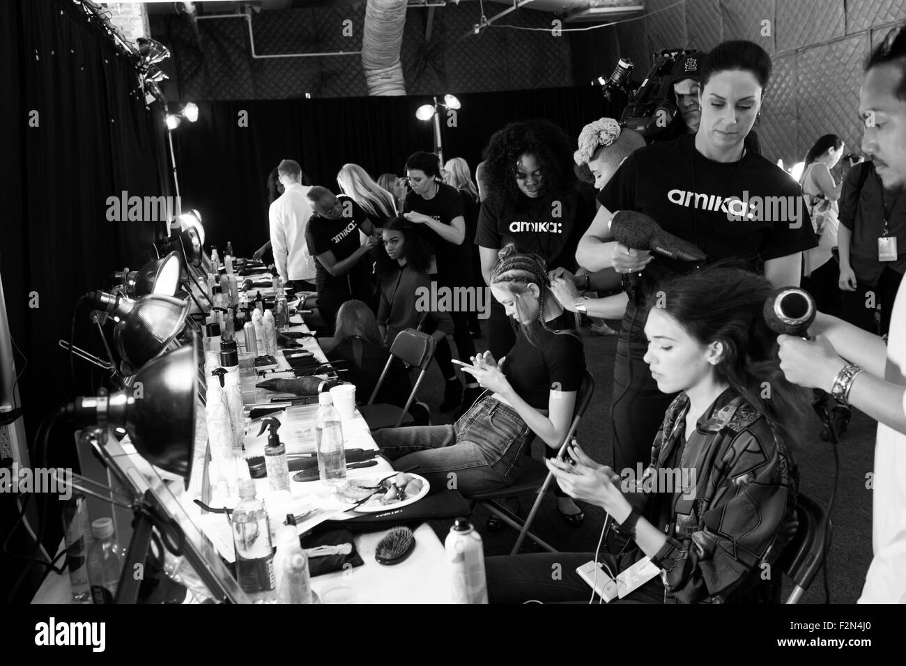 Models prepare backstage Black and White Stock Photos & Images - Alamy