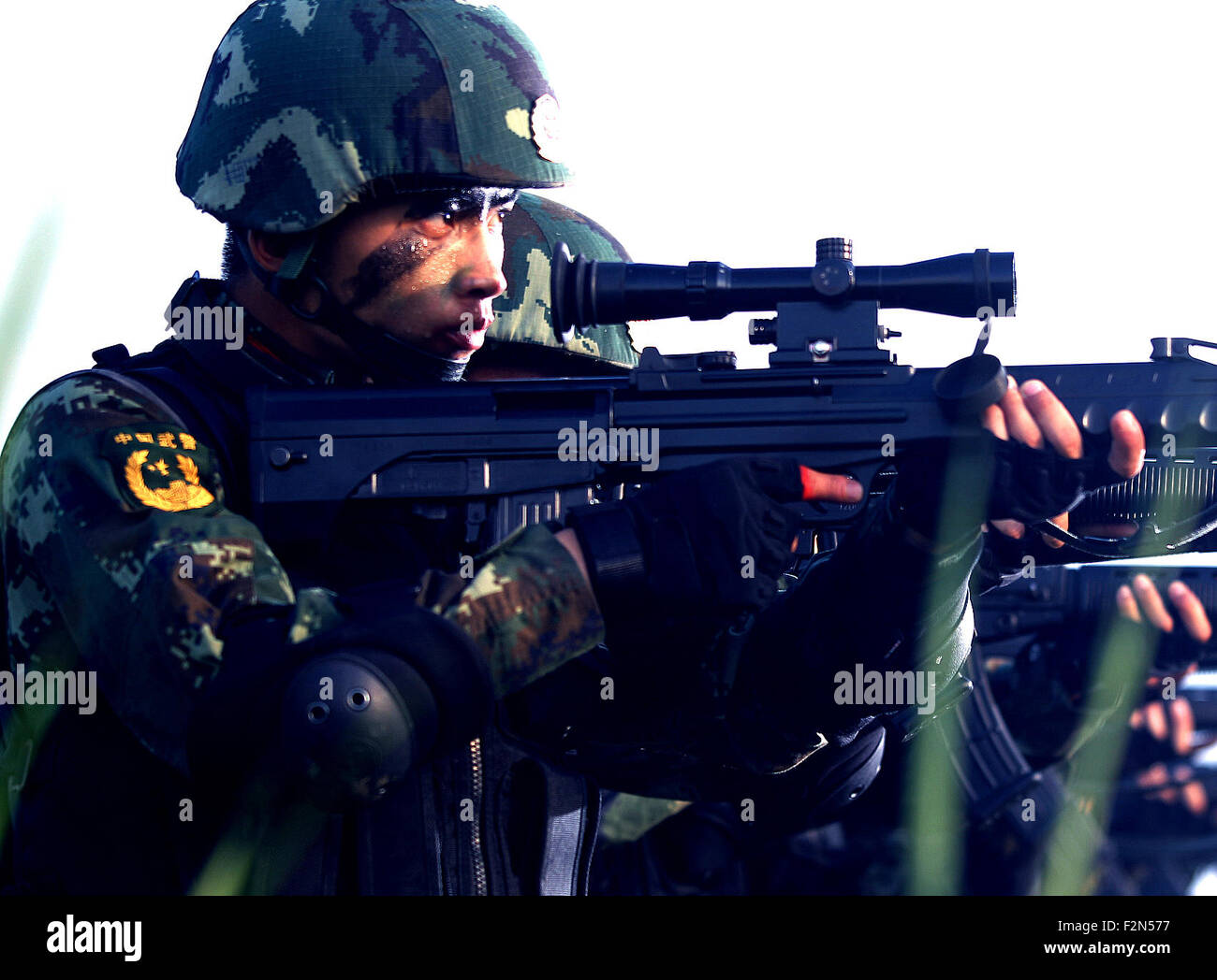 Shanghai, China. 21st Sep, 2015. Armed police sniper Li Jiancheng (L ...