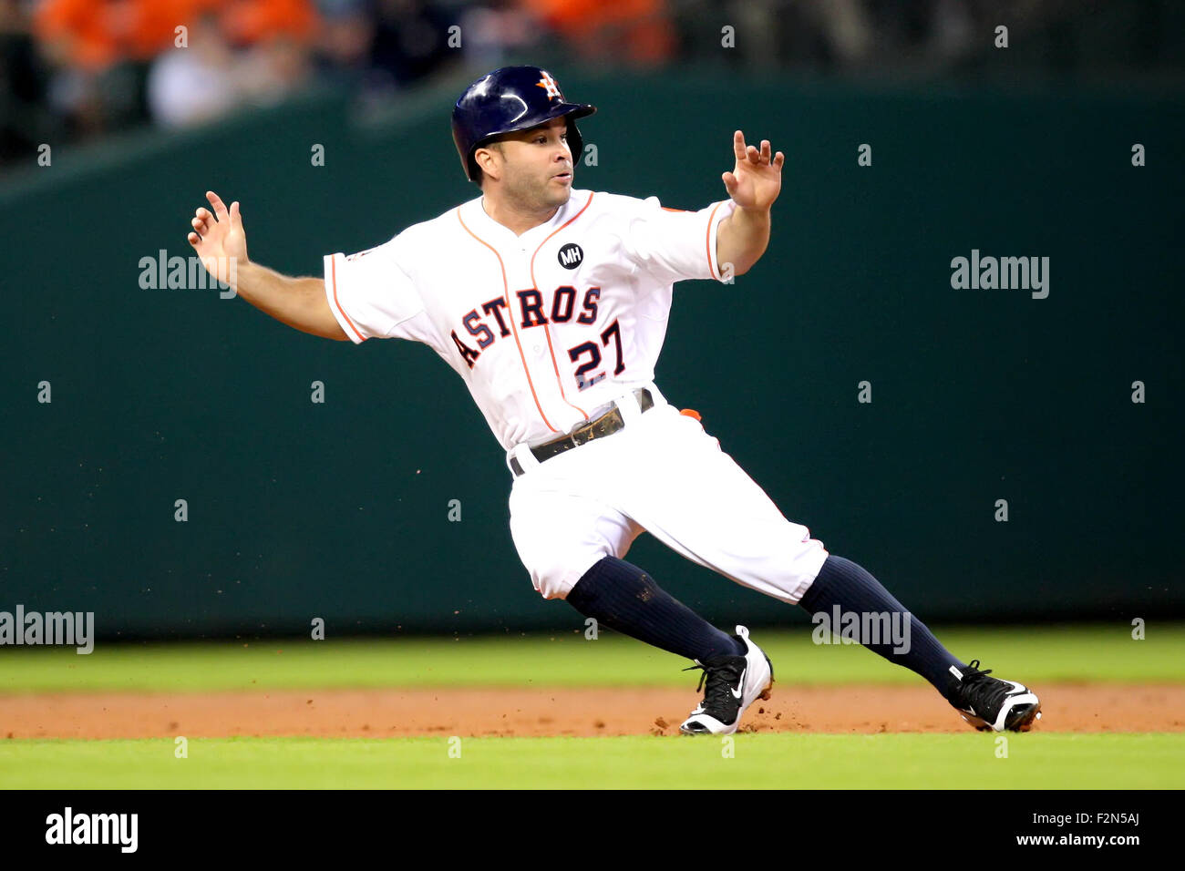 Houston, TX, USA. 21st Sep, 2015. Houston Astros second baseman Jose Altuve #27 gets stuck ...