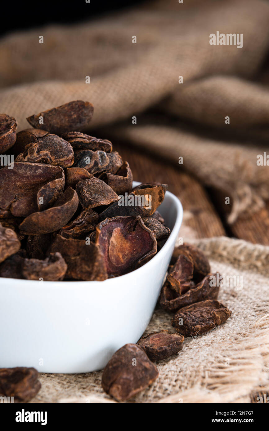 Whole dried Cola Nuts (close-up shot) on wooden background Stock Photo ...