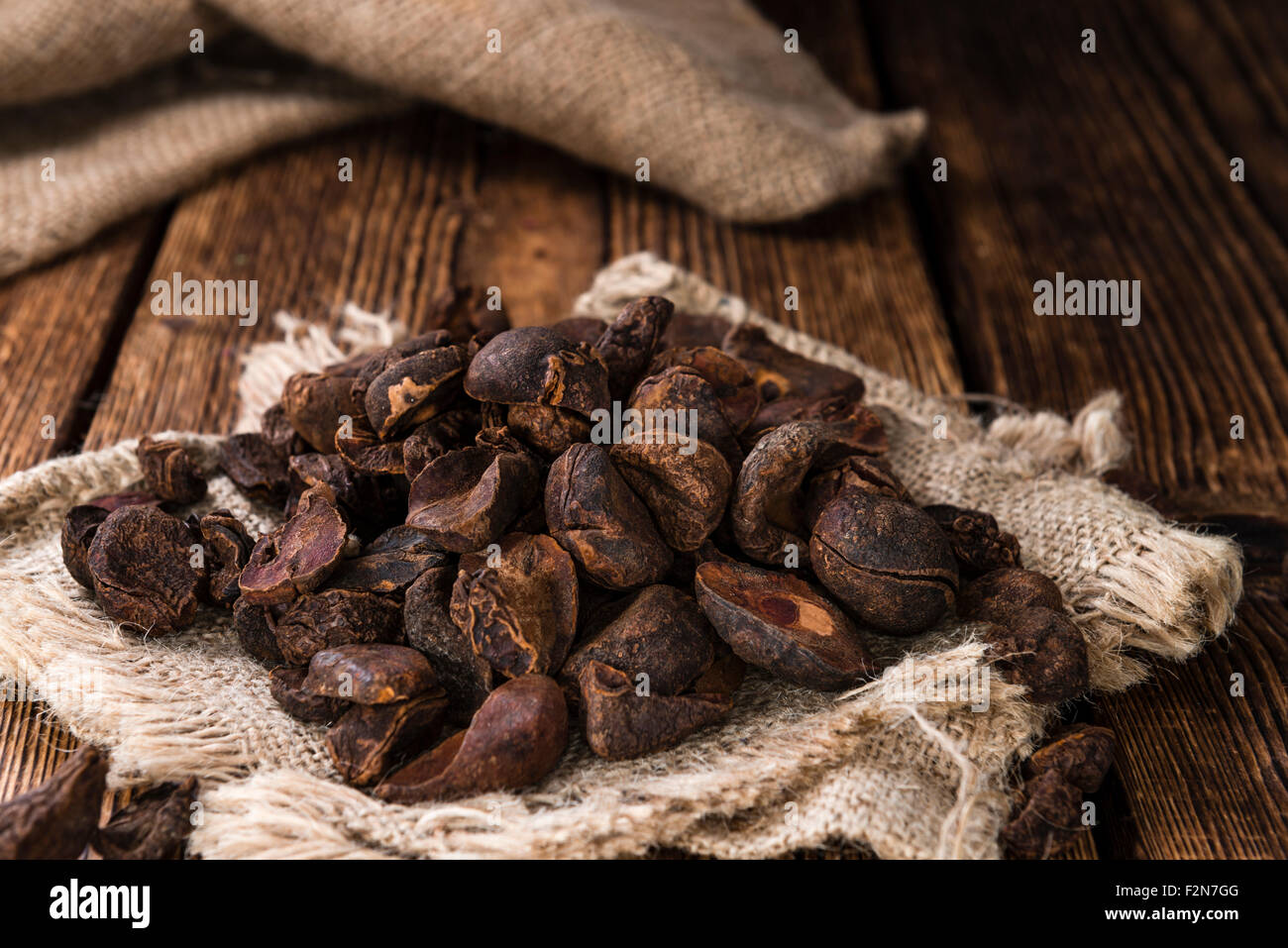 Cola Nuts (dried) as close-up shot on rustic wooden background Stock ...