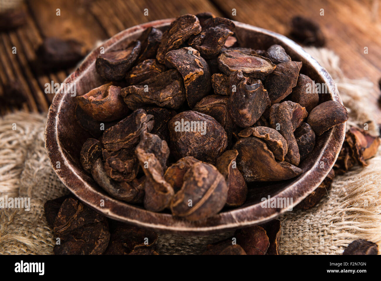 Cola Nuts (dried) as close-up shot on rustic wooden background Stock ...