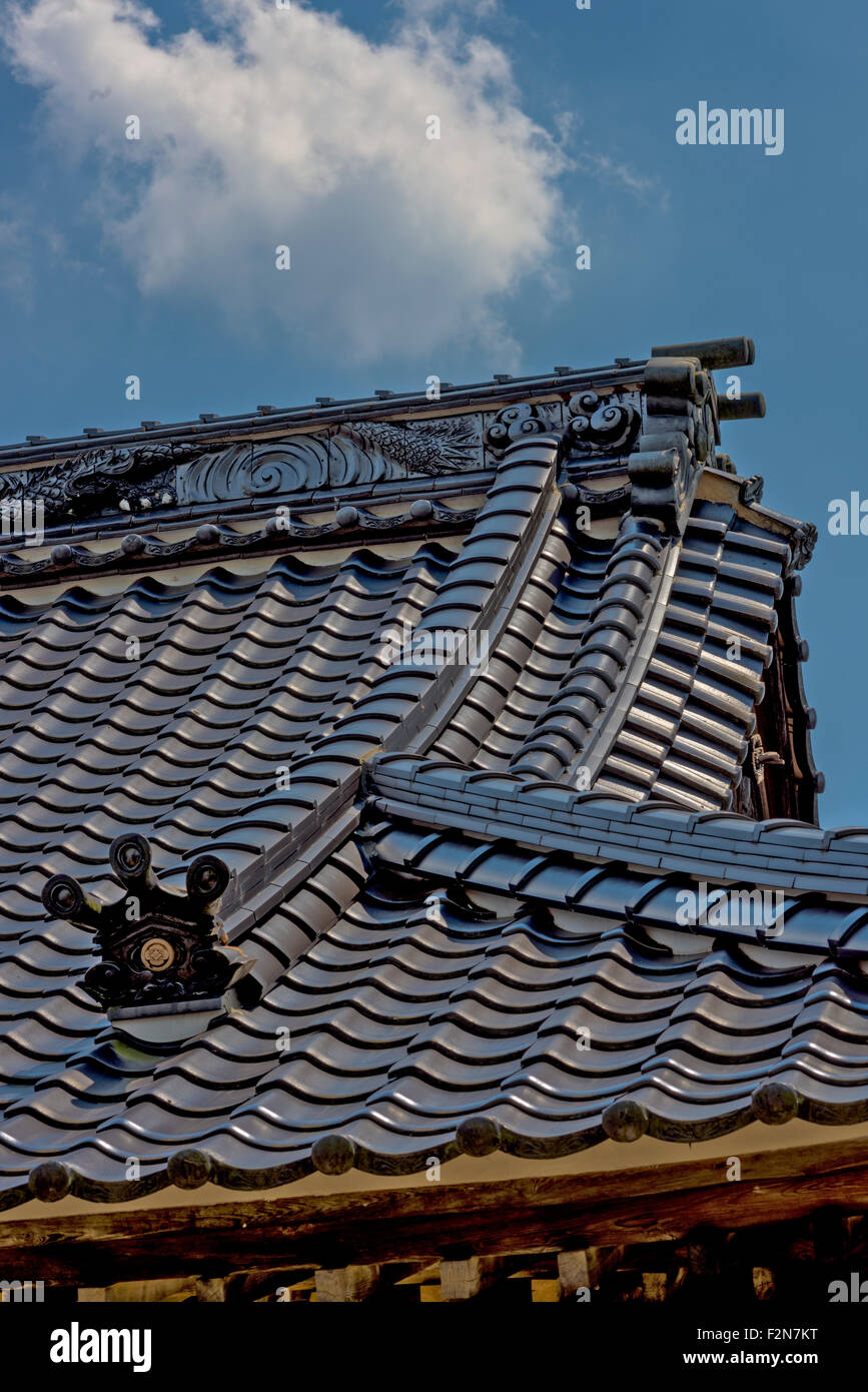 Classic roof style in Japan with blue sky and cloud Stock Photo - Alamy