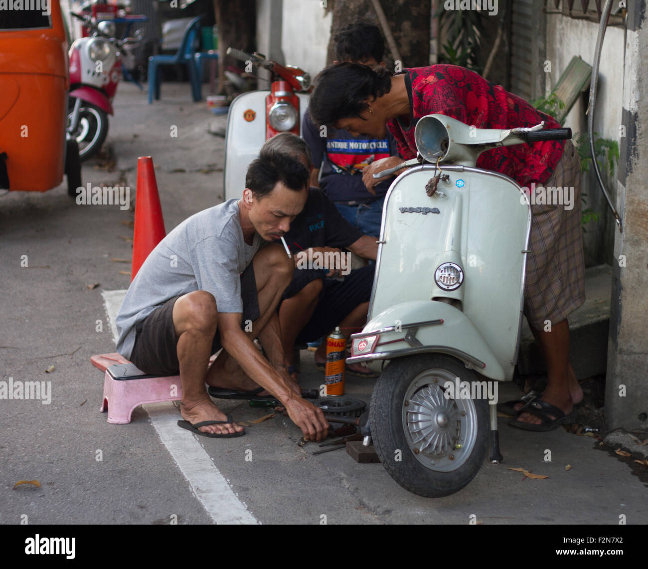 vespa moped being fixed Stock Photo - Alamy