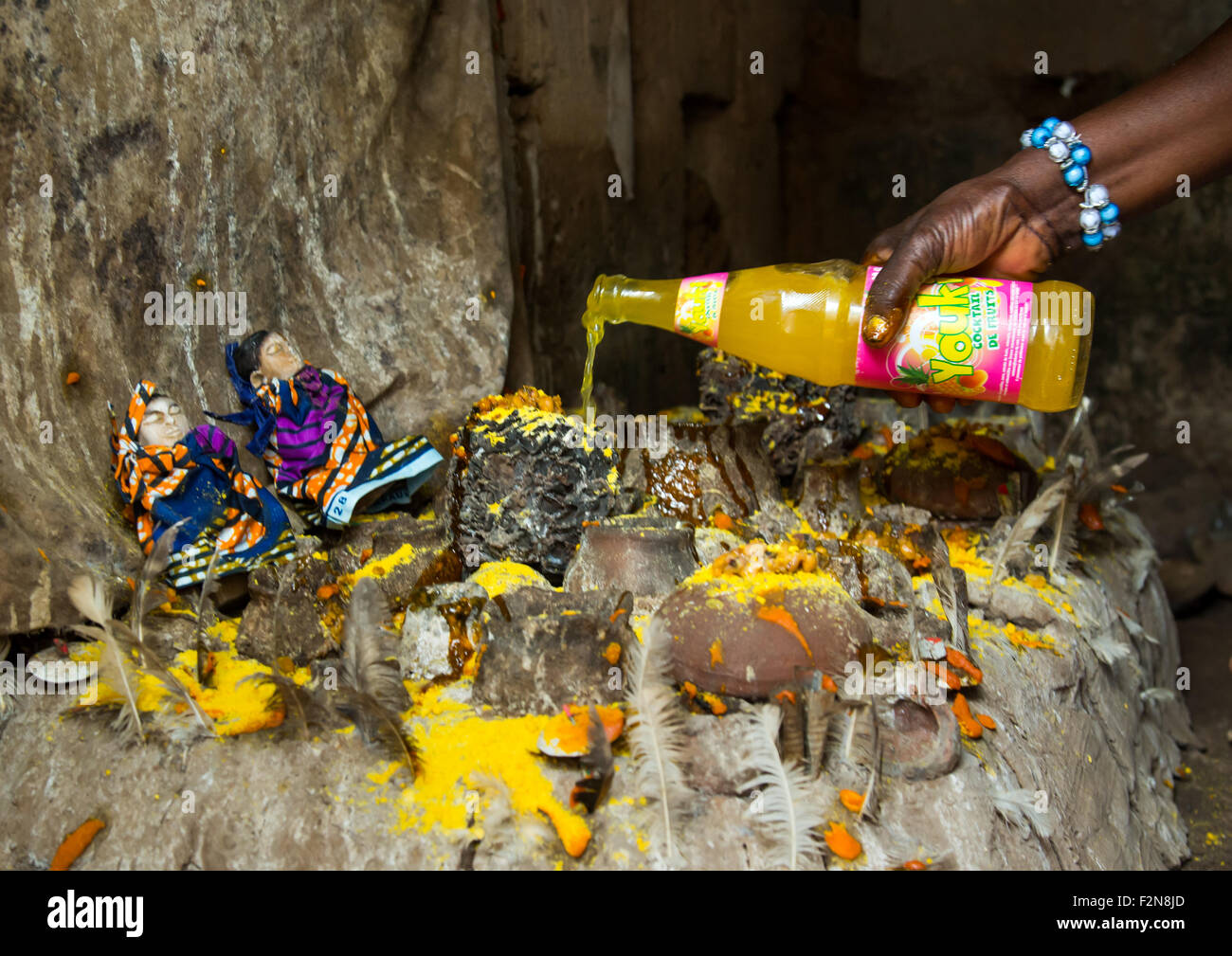 Benin, West Africa, Bopa, miss hounyoga putting fruit juice offerings ...
